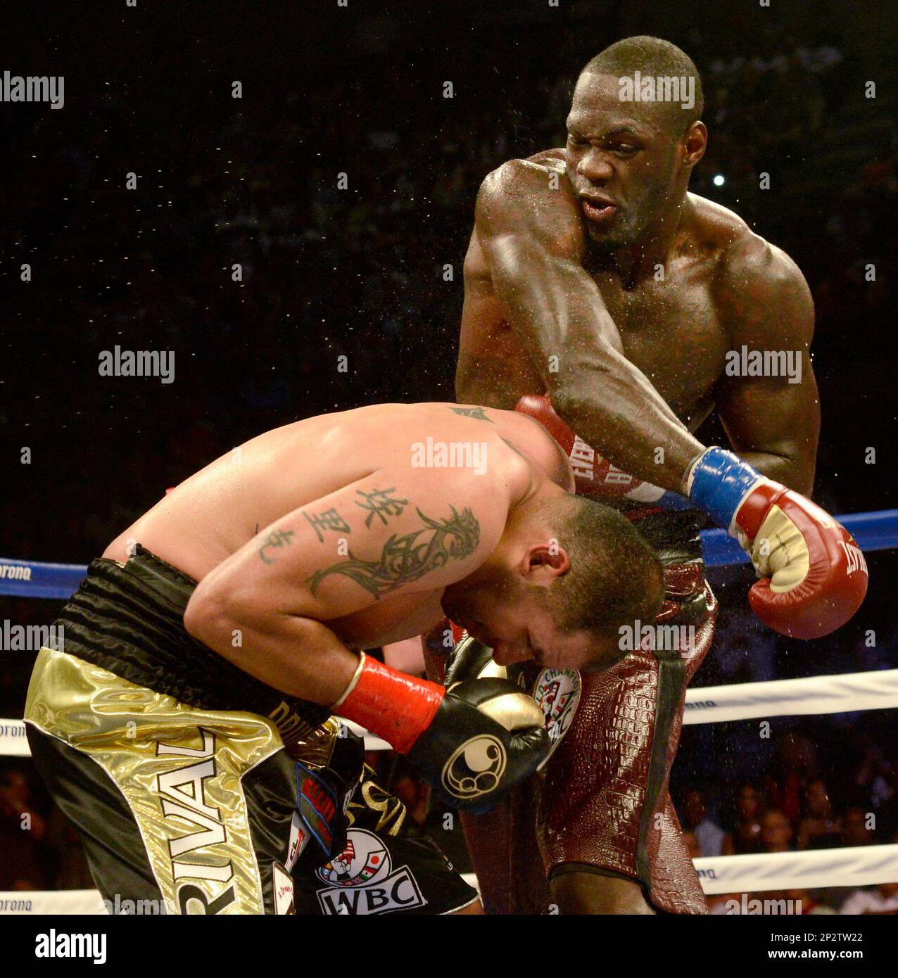 Deontay Wilder follows through on a punch to Eric Molina in a WBC ...