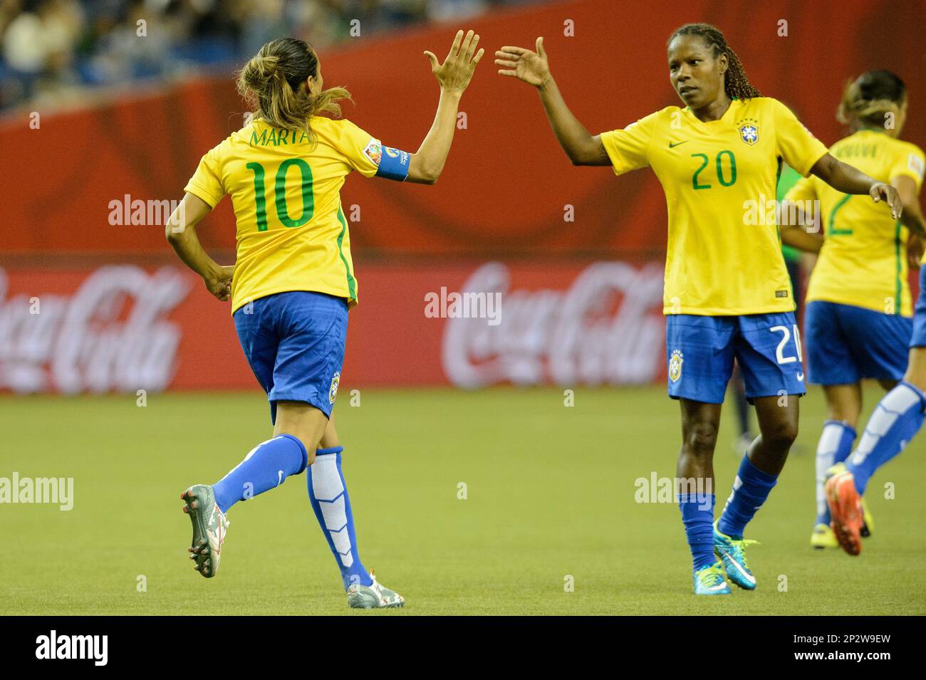 Marta (10) of Brazil celebrating her goal with Formiga (20) of Brazil ...