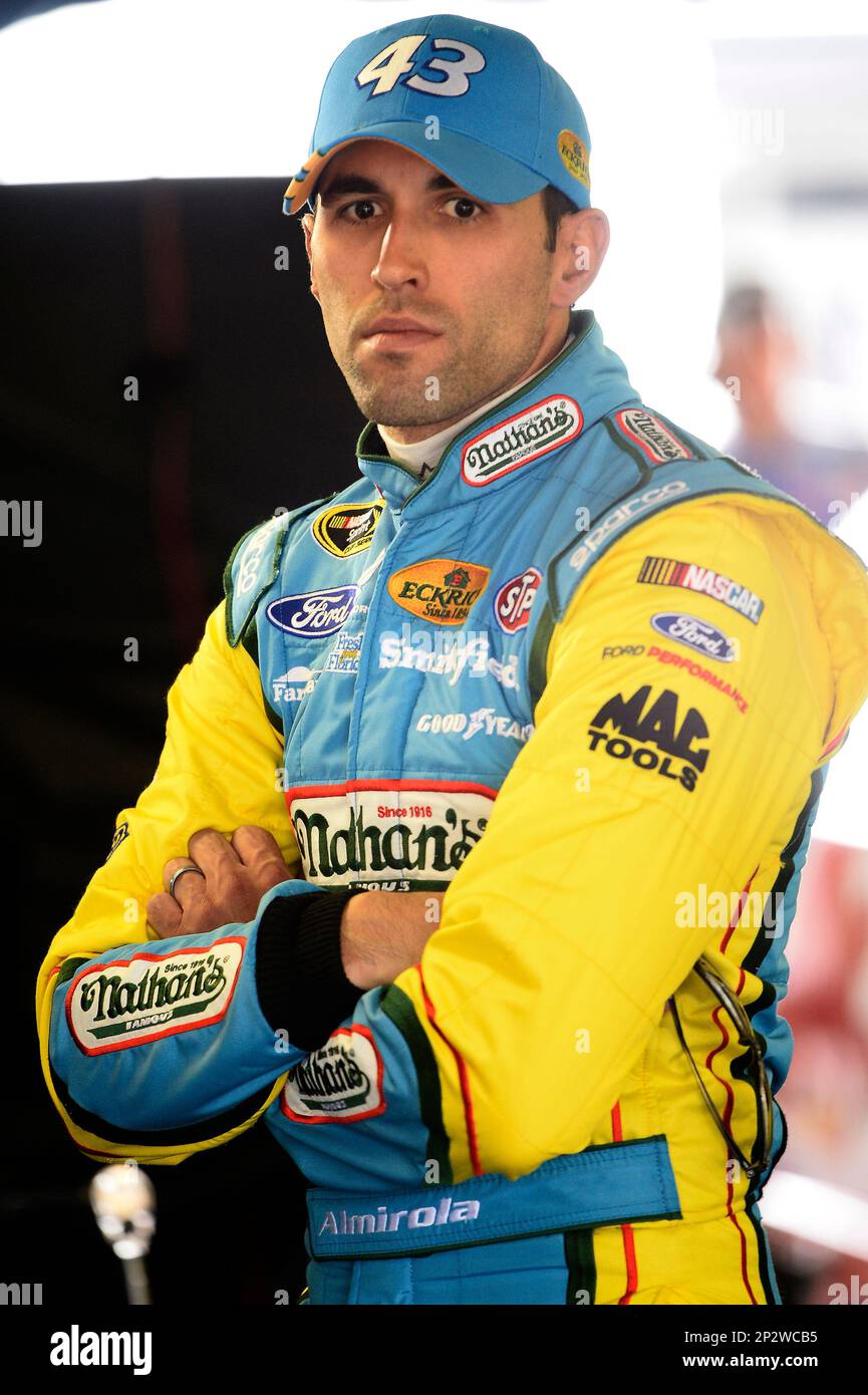 Aric Almirola (43), stands in the garage during practice for the Sunday ...