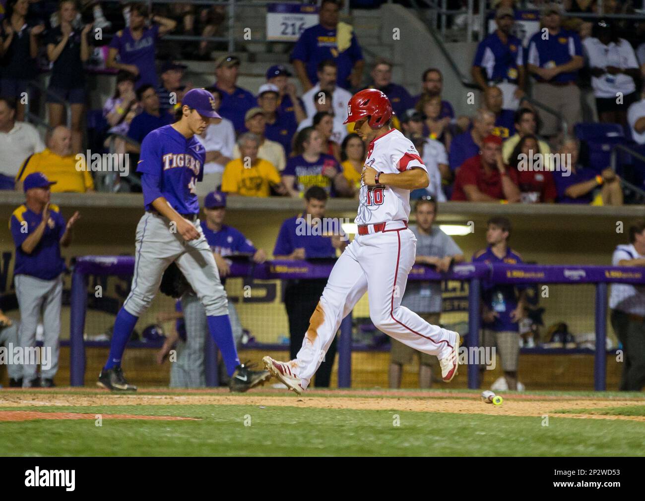 June 07, 2015 - LSU infielder Grayson Byrd (10) crosses home plate for ...