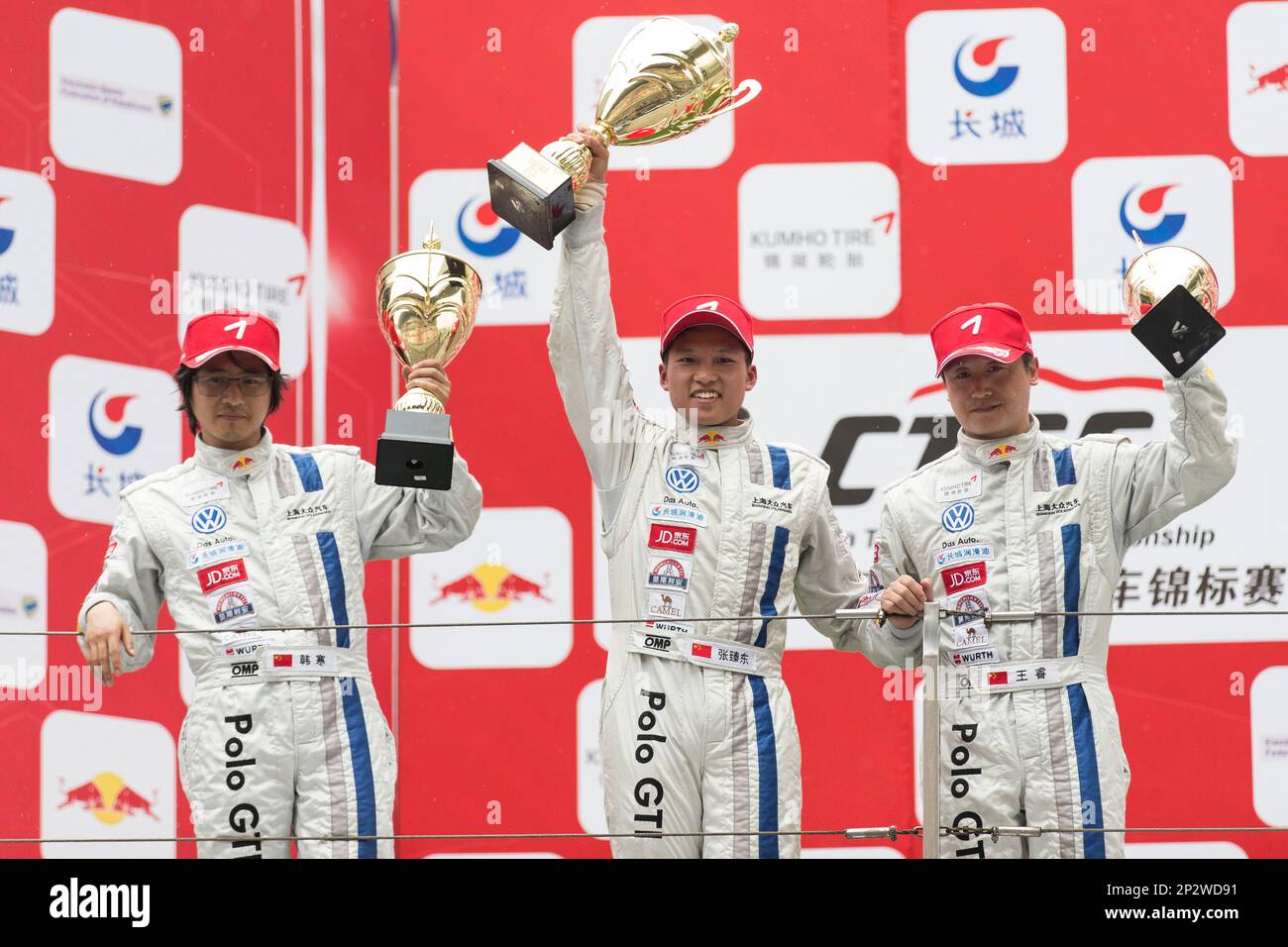 (From left) Chinese author and racer Han Han, Zhang Zhendong and Wang ...