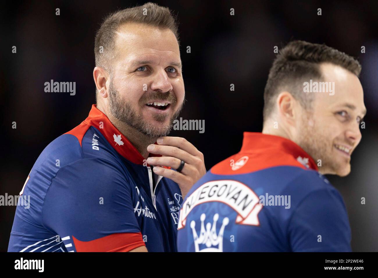 Team Wild Card #2 third, Derek Samagalski, left, shares a laugh with ...