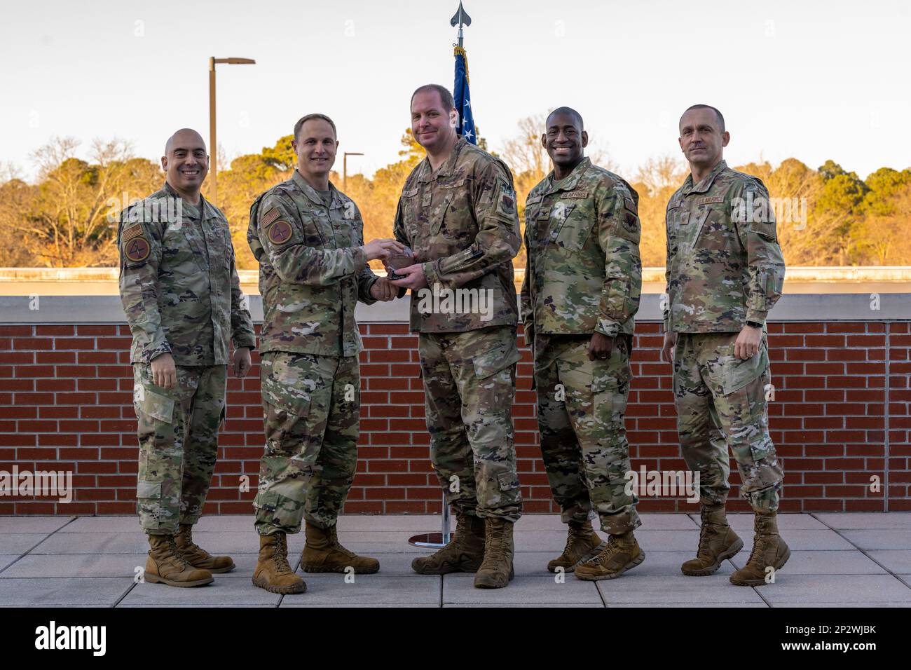 From left, Chief Master Sgt. Peter Martinez, 4th Fighter Wing command ...