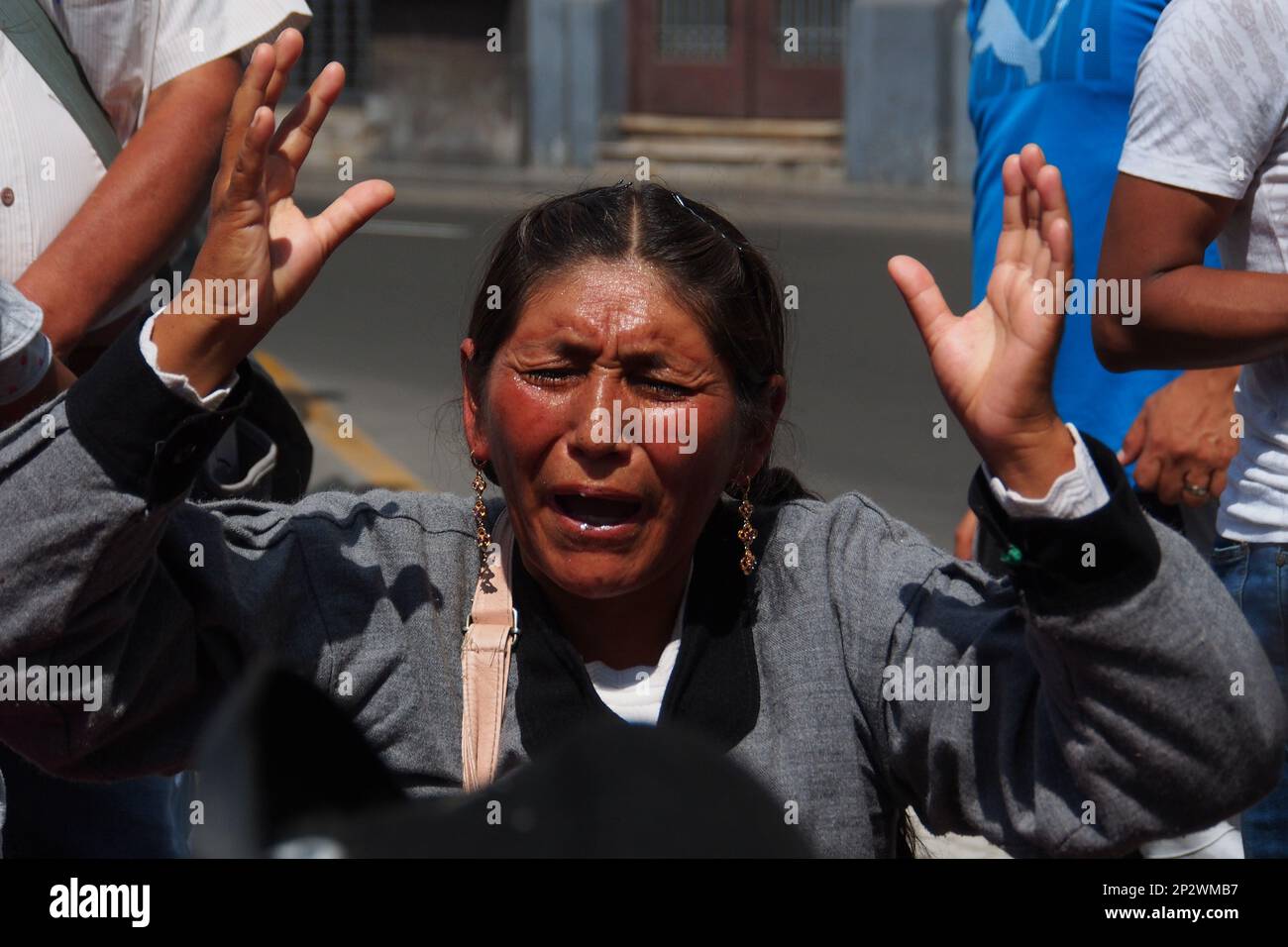 A woman crying when a group of indigenous women carry out a healing ...