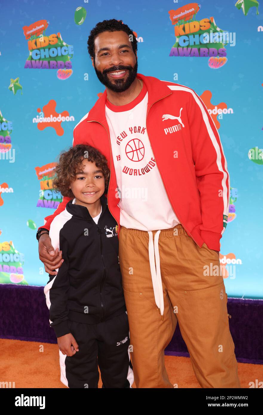 Jamil Hardwick, right, arrives at the Nickelodeon Kids' Choice Awards ...