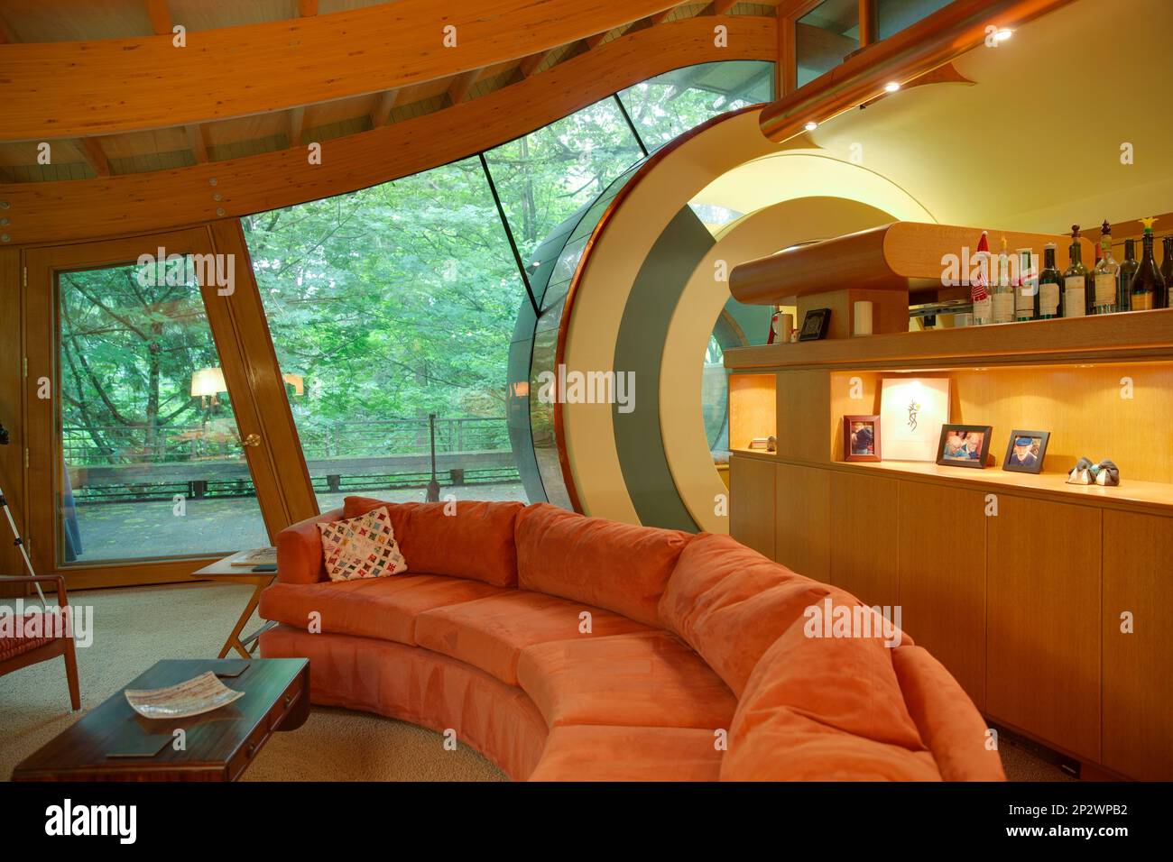 Geometric shapes (including the door to an outside deck) meet curved ...
