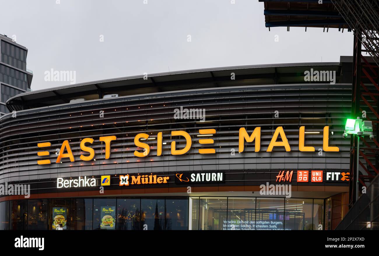 East Side Mall shopping center in the city. Illuminated name on the ...