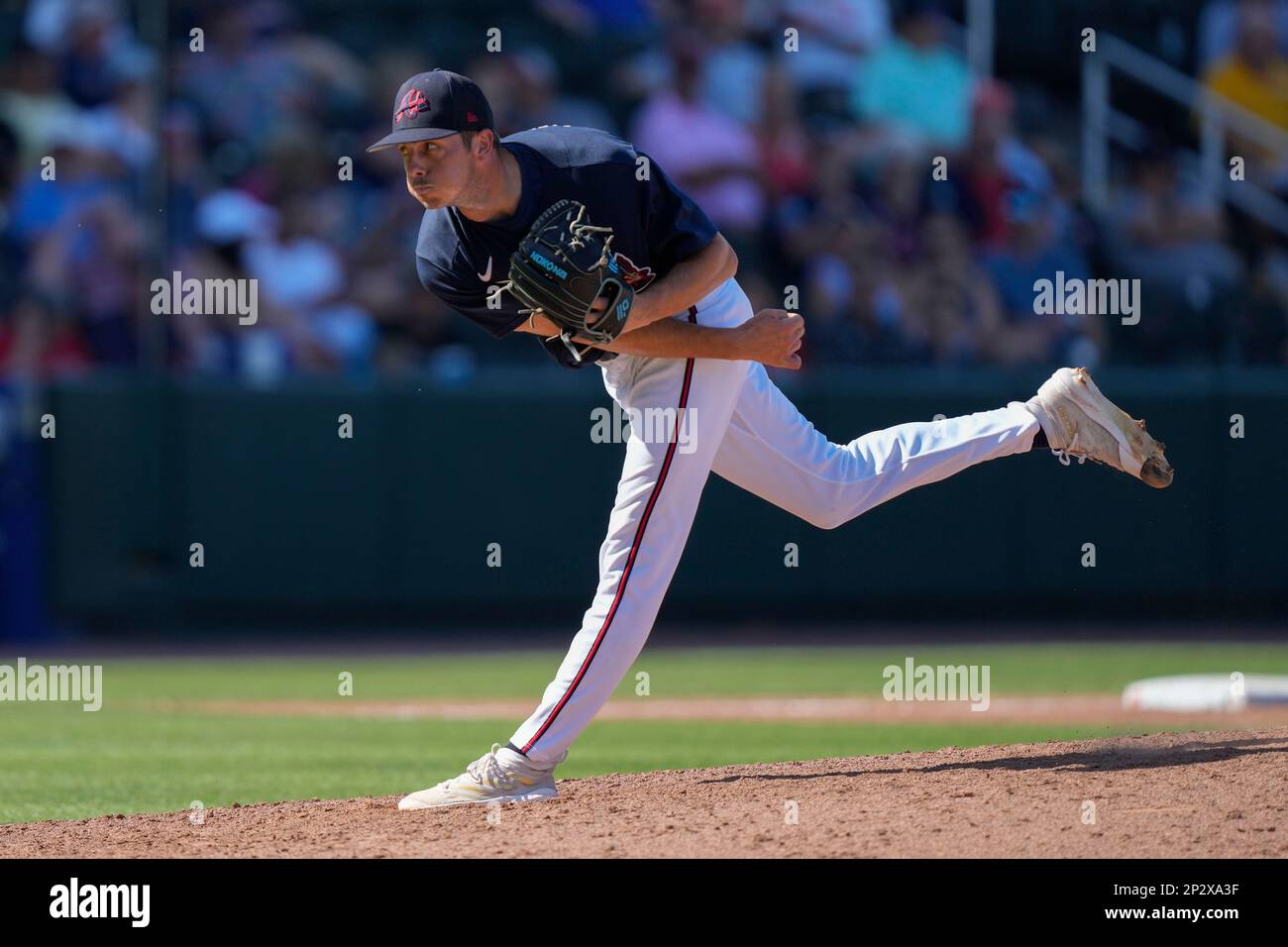 Atlanta Braves pitcher Allan Winans throws in the eighth inning of a ...