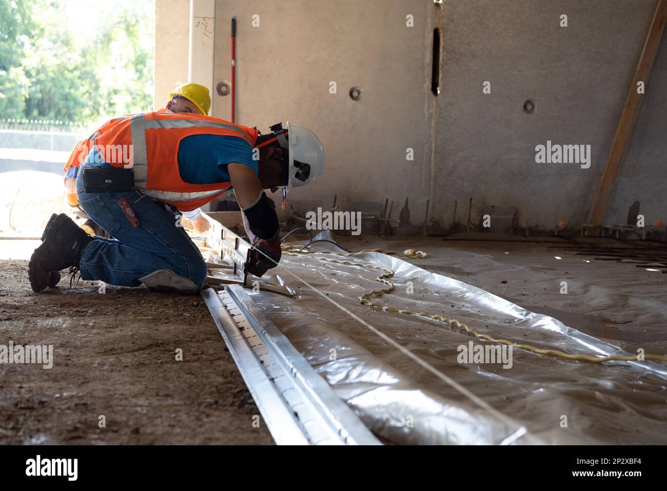 A civilian contractor ties rebar and framing at the Puerto Rico Air ...