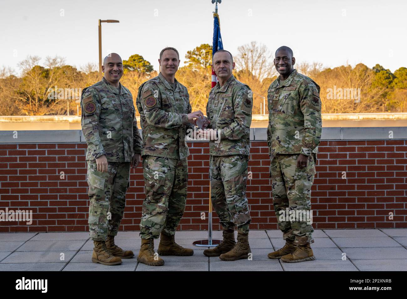 From left, Chief Master Sgt. Peter Martinez, 4th Fighter Wing command ...