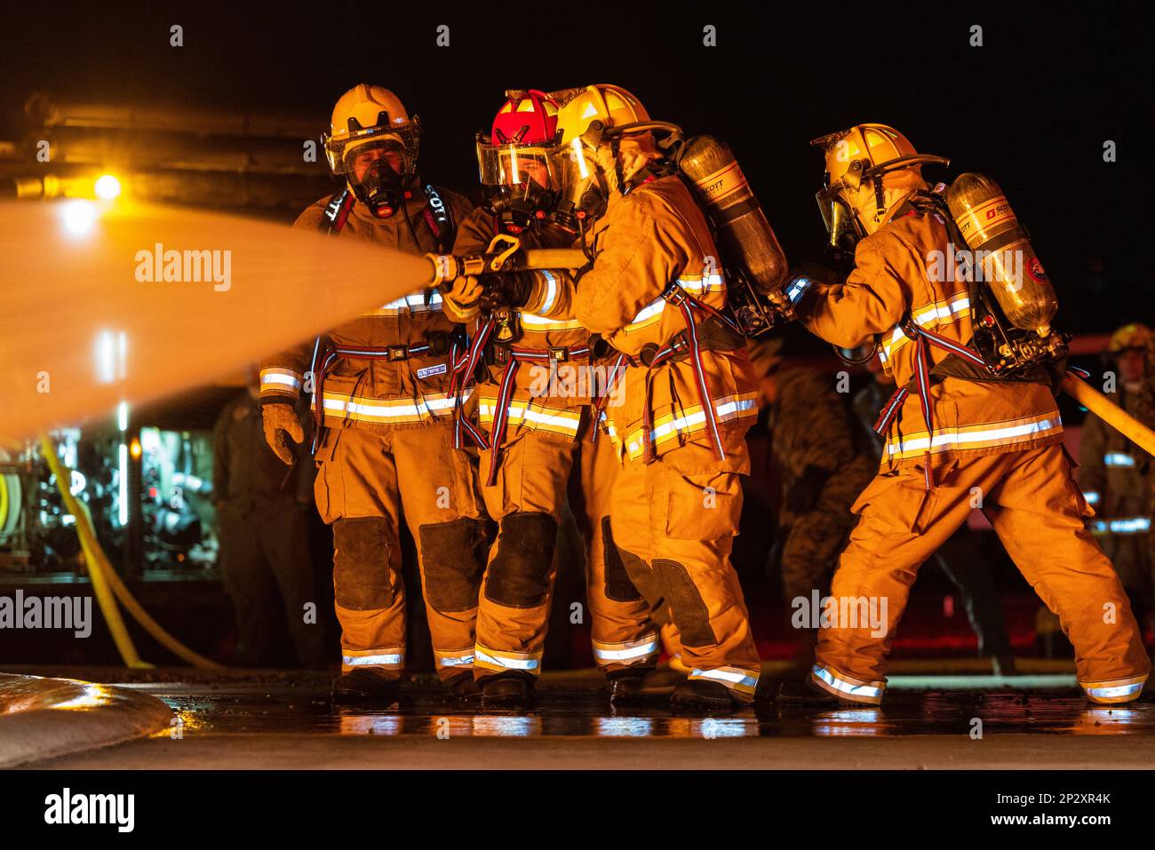 U.S. Marines with Aircraft Rescue and Firefighting, Headquarters and ...