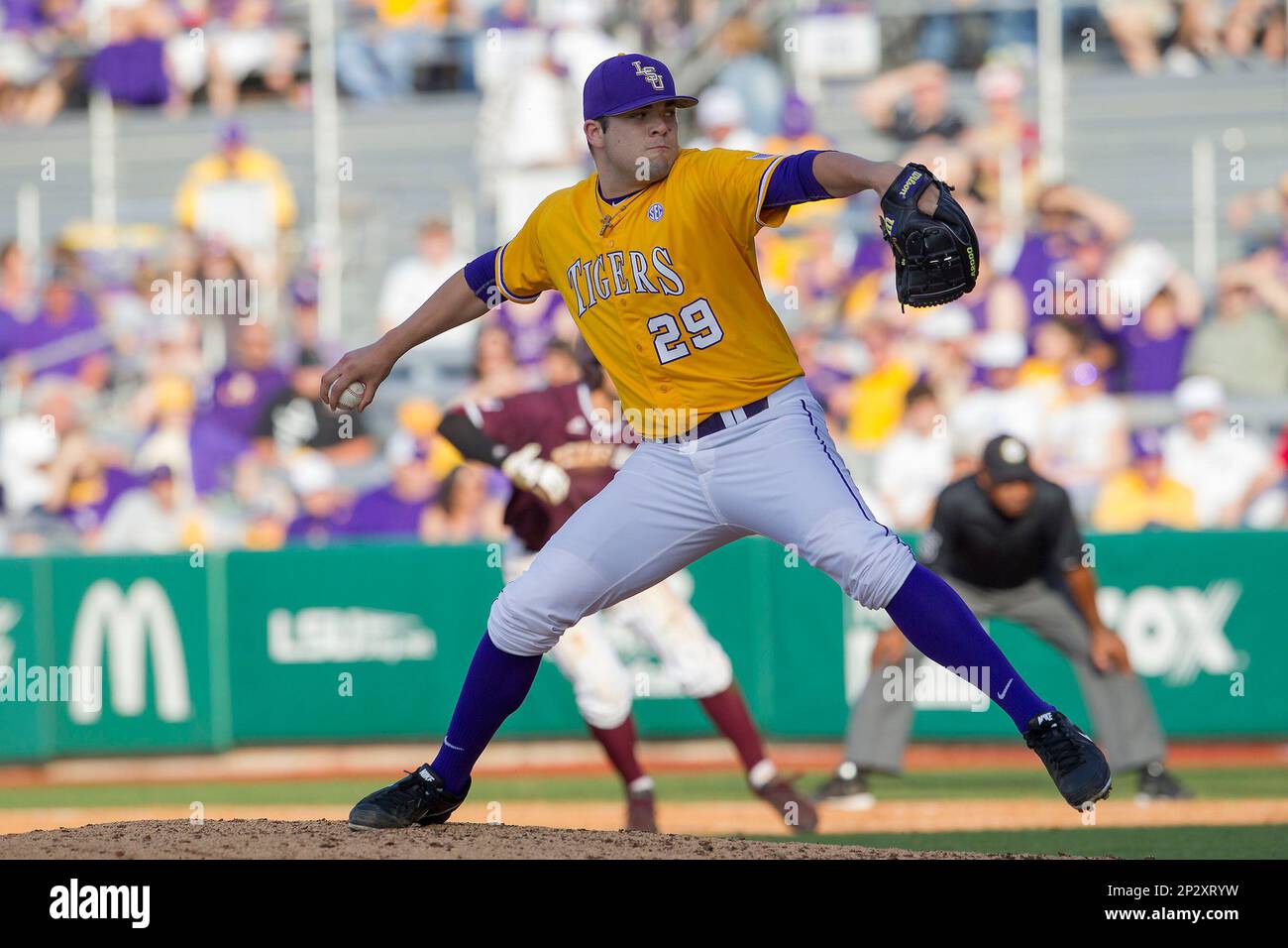 LSU Tigers pitcher Jake Godfrey (29) delivers a pitch to the plate ...