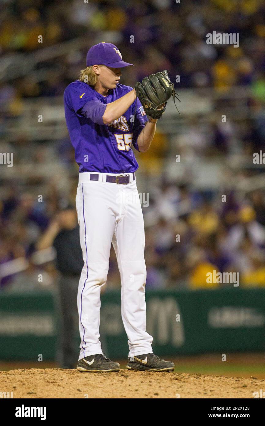 LSU Tigers pitcher Hunter Newman (55) looks to his catcher for the sign ...