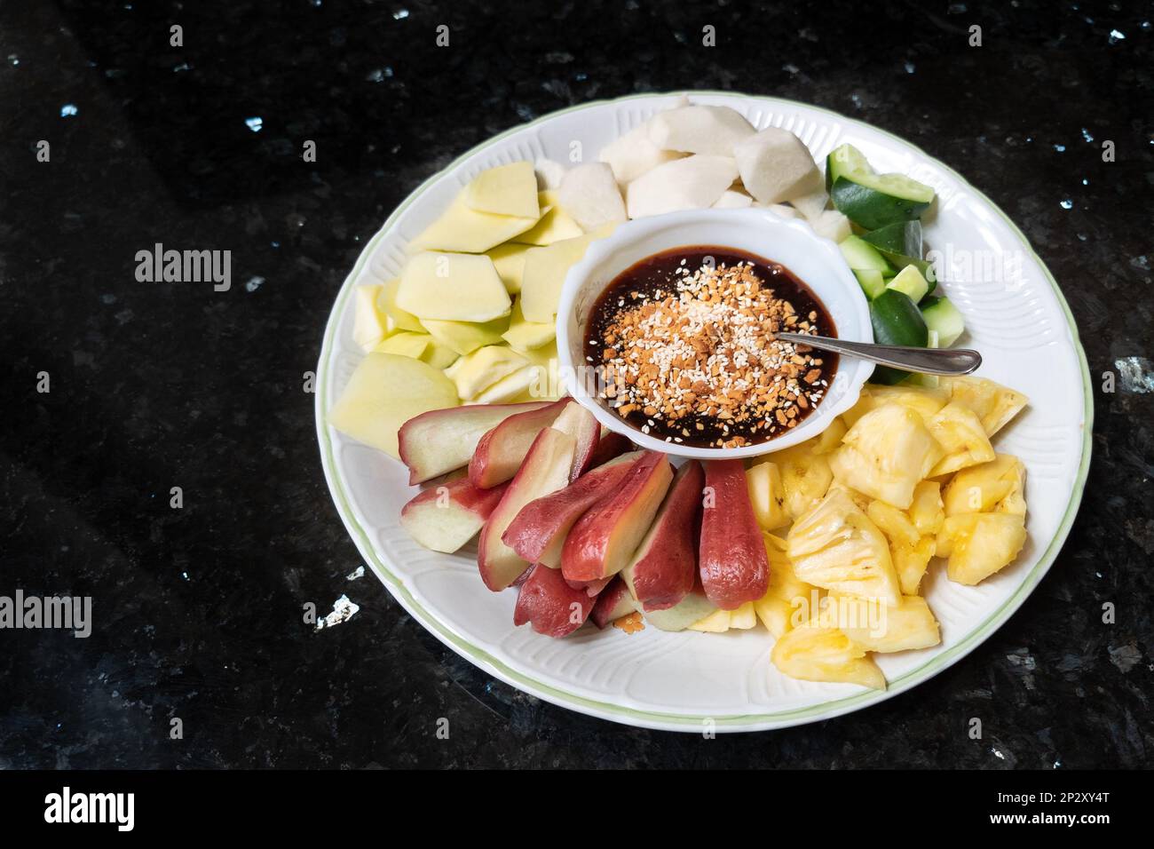 Rojak buah or fruit salad is popular traditional appetizer in Malaysia ...