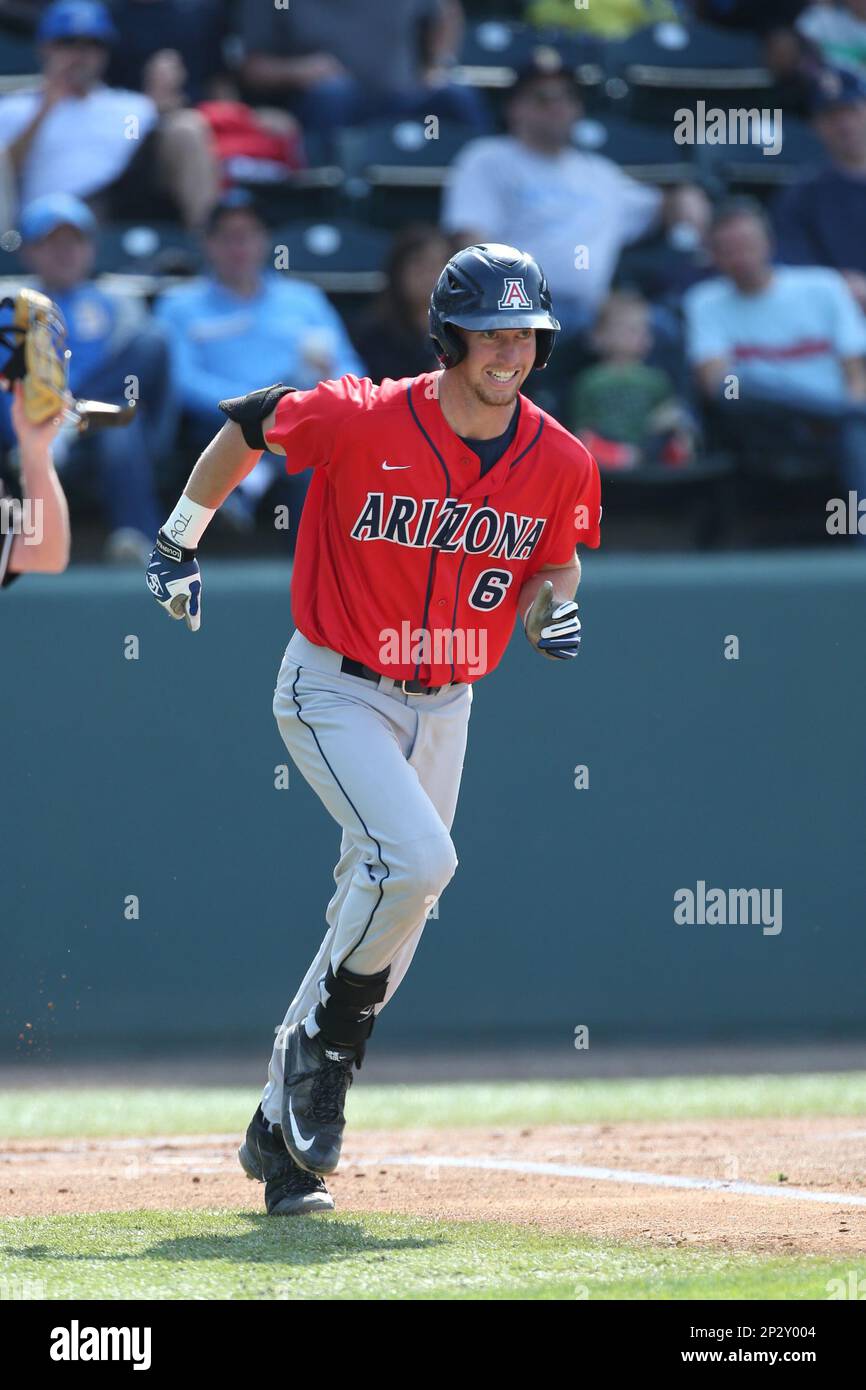 Riley Moore (6) of the Arizona Wildcats runs to first base during a ...