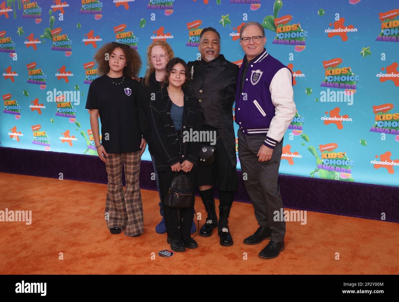 Scotch Ellis Loring, second from right, and Todd Holland, right, arrive ...