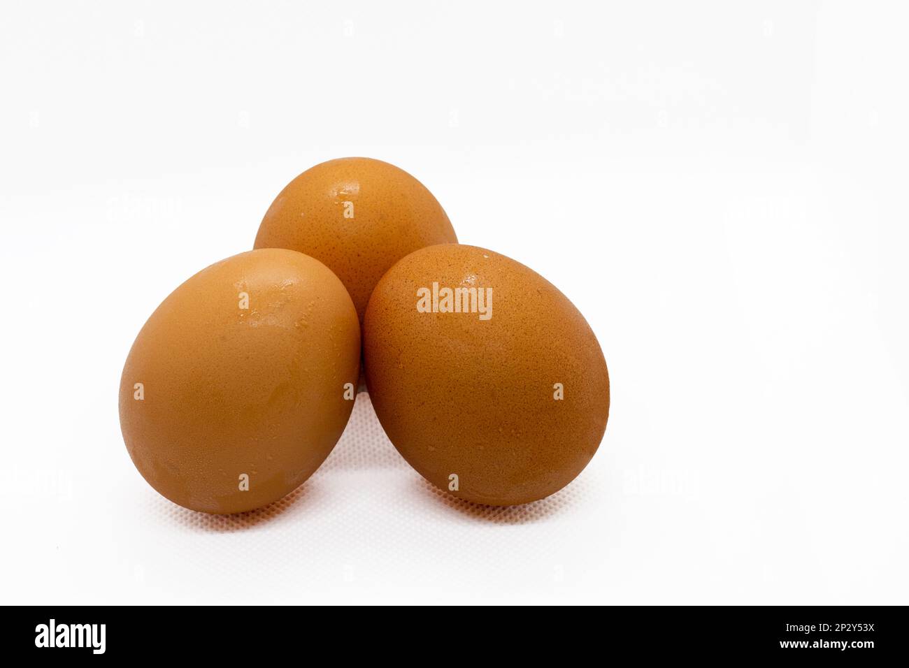 group of creole eggs, on white background Stock Photo - Alamy
