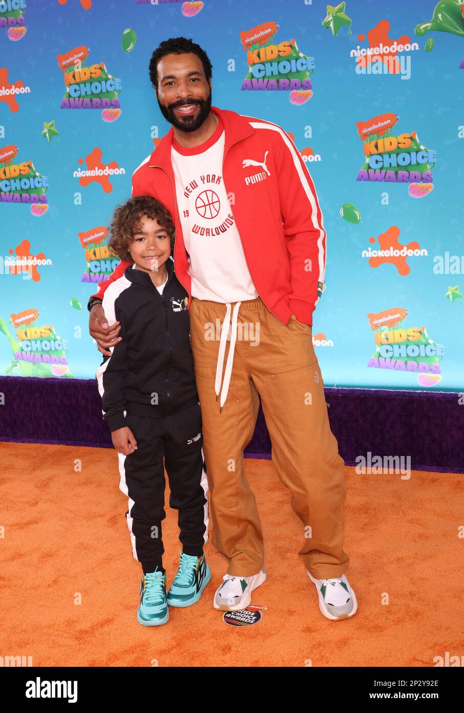 Jamil Hardwick, right, arrives at the Nickelodeon Kids' Choice Awards ...