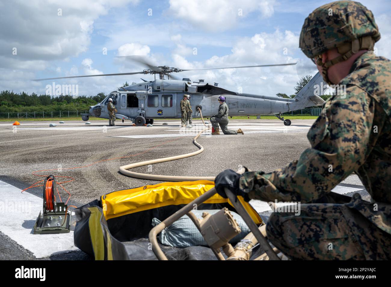 NAVAL BASE GUAM, Santa Rita, Guam (Feb. 14, 2023) Navy Cargo Handling ...