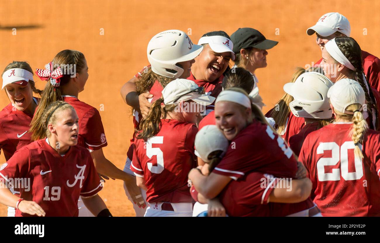 Alabama infielder Leona Lafaele (24) hugs and celebrates with Alabama ...