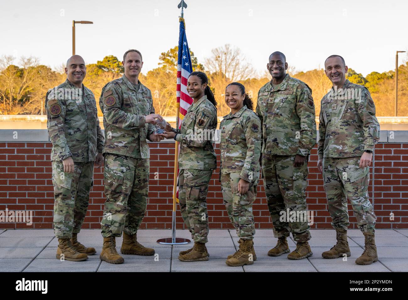 From left, Chief Master Sgt. Peter Martinez, 4th Fighter Wing command ...