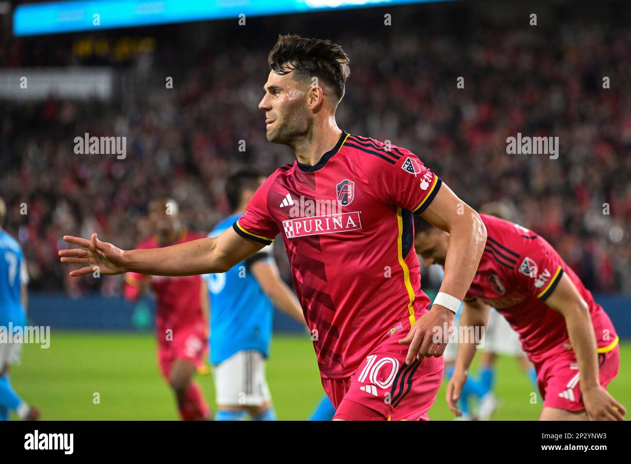 St. Louis City midfielder Eduard Lowen (10) reacts after scoring on a ...