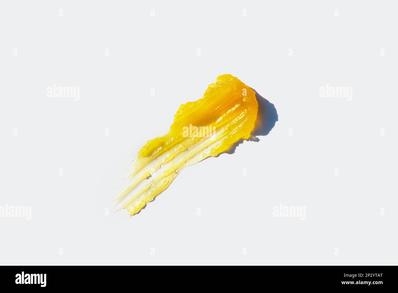 Closeup texture of yellow skin care oil, beauty concept Stock Photo - Alamy