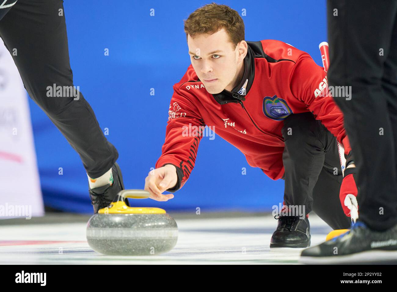 Newfoundland and Labrador skip Nathan Young releases his shot during ...