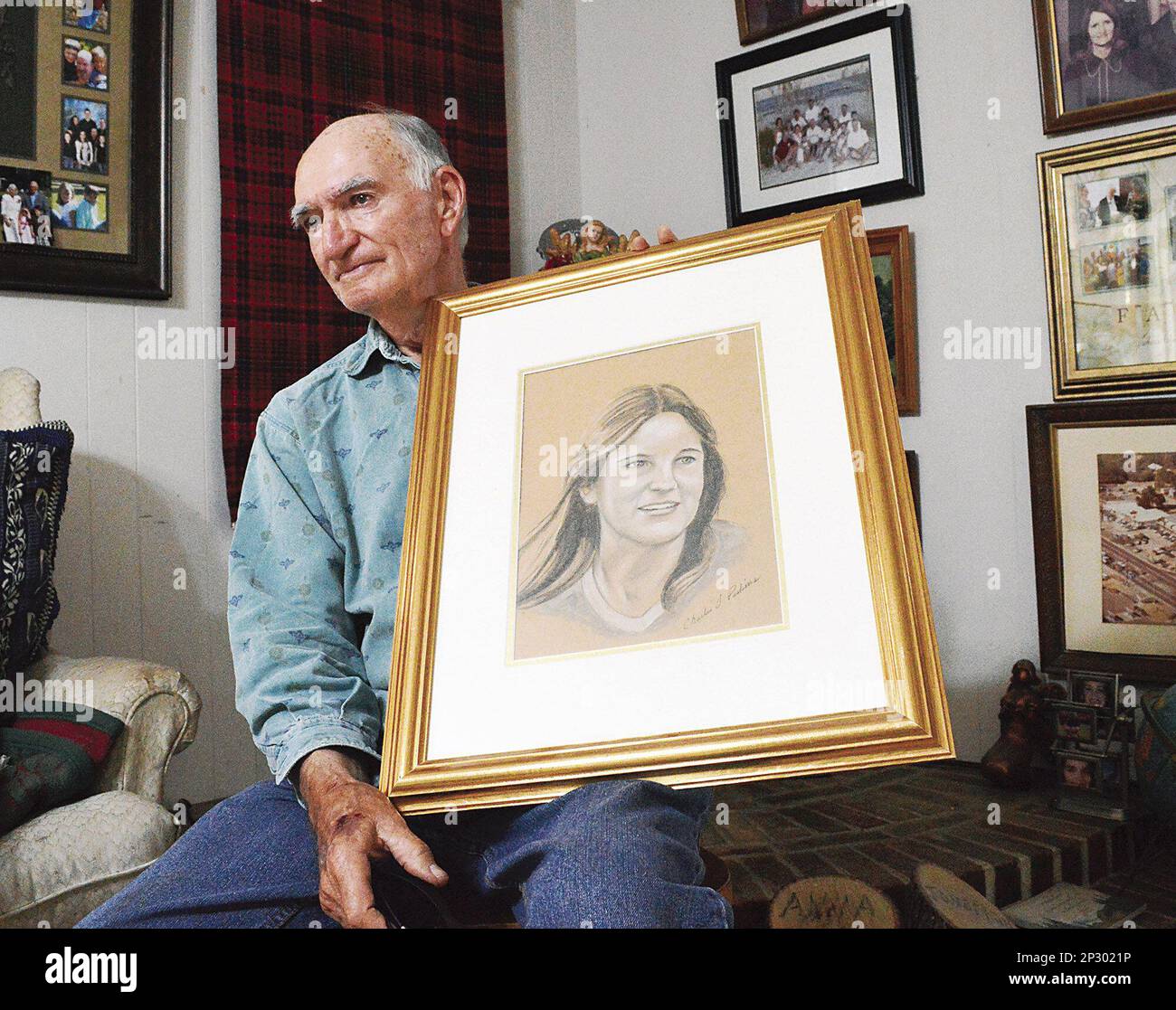 In this May 5, 2015 photo, John Lumsden poses for a photo holding a ...