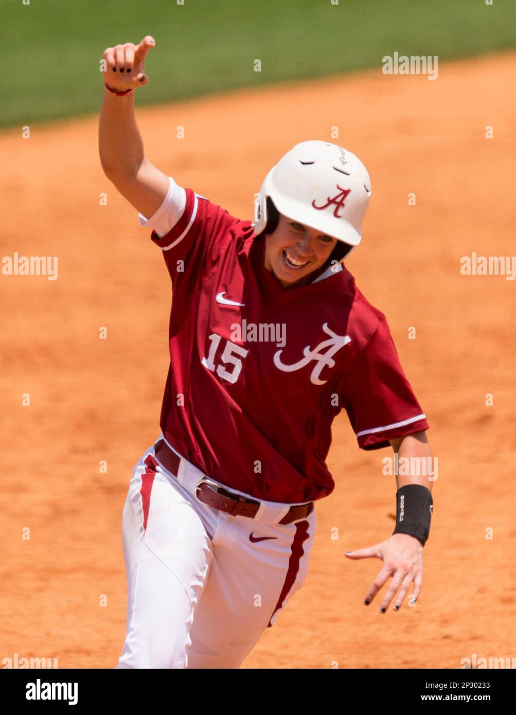 Alabama infielder Danae Hays (15) celebrates the three-run home run by ...