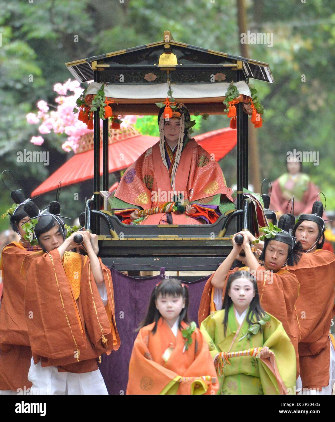 Acting High priestess (C) dressed as court lady of the Heian Period ...