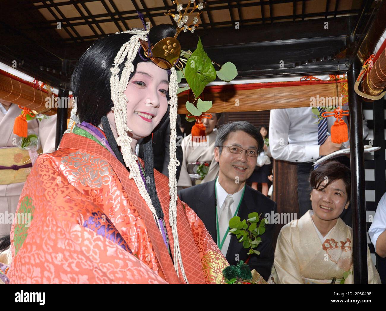 Acting High priestess (L) dressed as court lady of the Heian Period ...