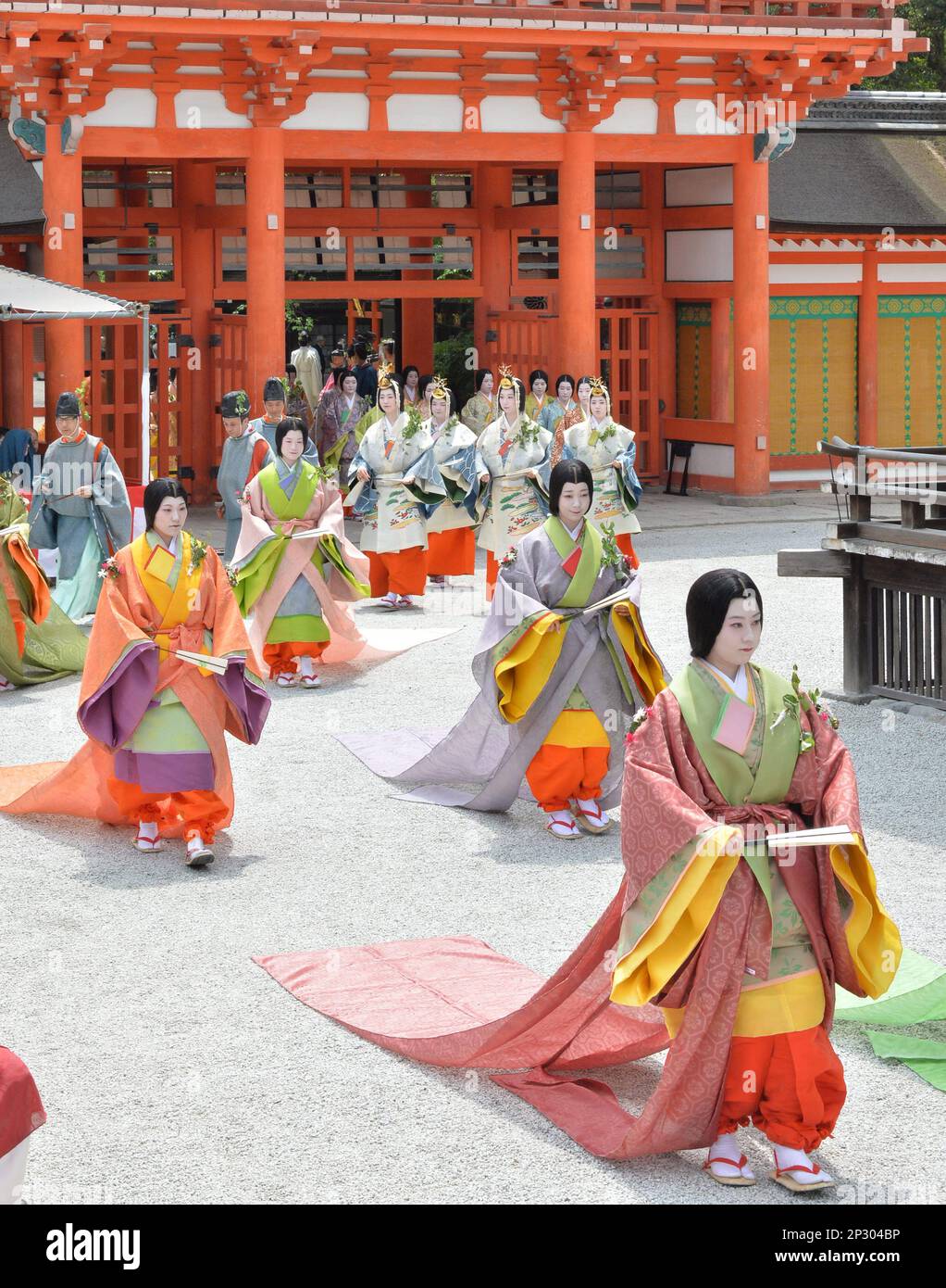 People dressed as court ladies of the Heian Period parade in Sakyo Ward ...