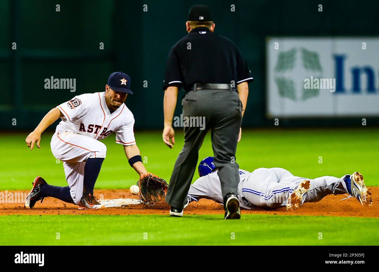 May 14, 2015: Houston Astros Second base Jose Altuve (27) attempts to tag Toronto Blue Jays ...