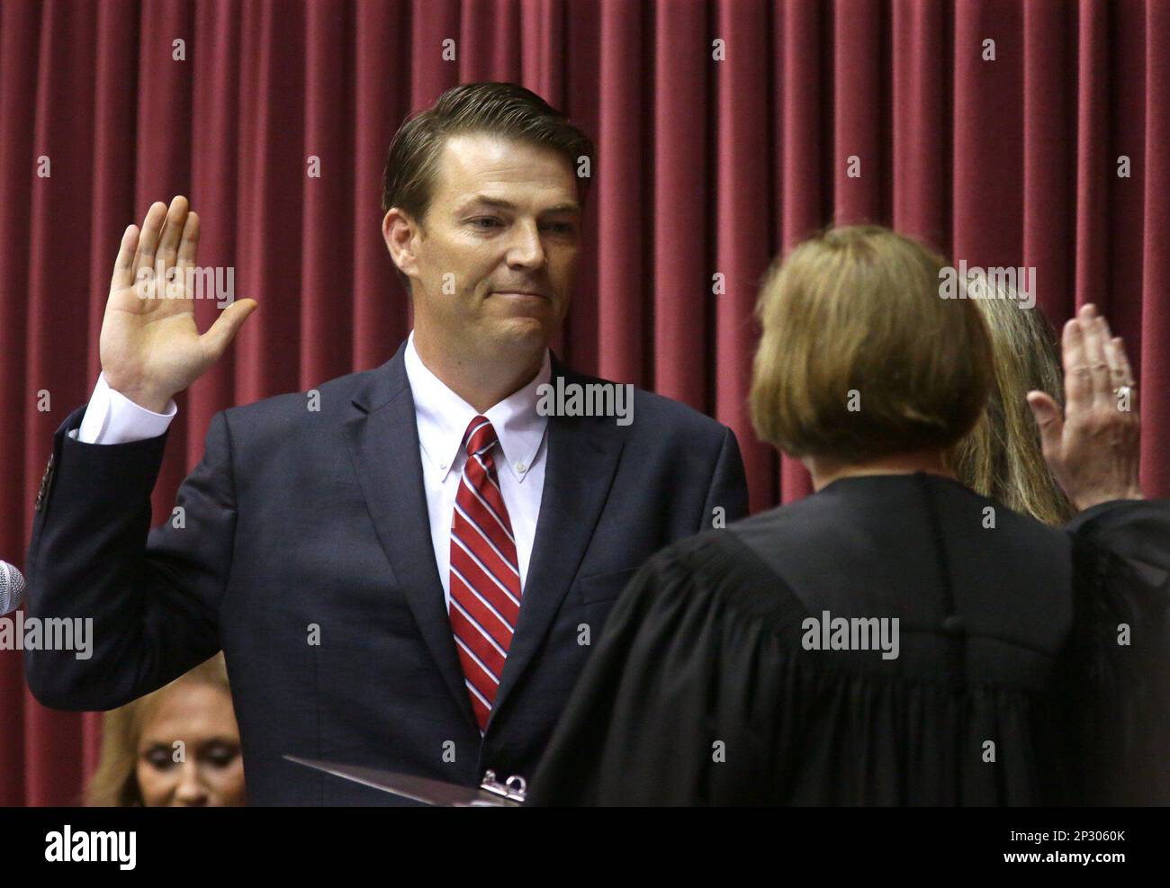 State Rep.Todd Richardson, left, is sworn in as the new Missouri House ...