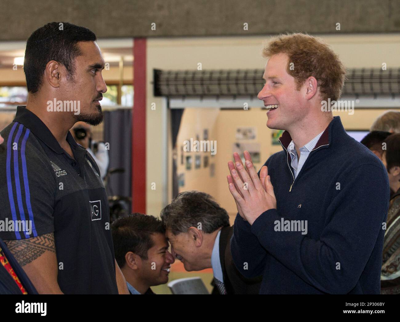 Britain's Prince Harry, right, talks with New Zealand Rugby Union ...