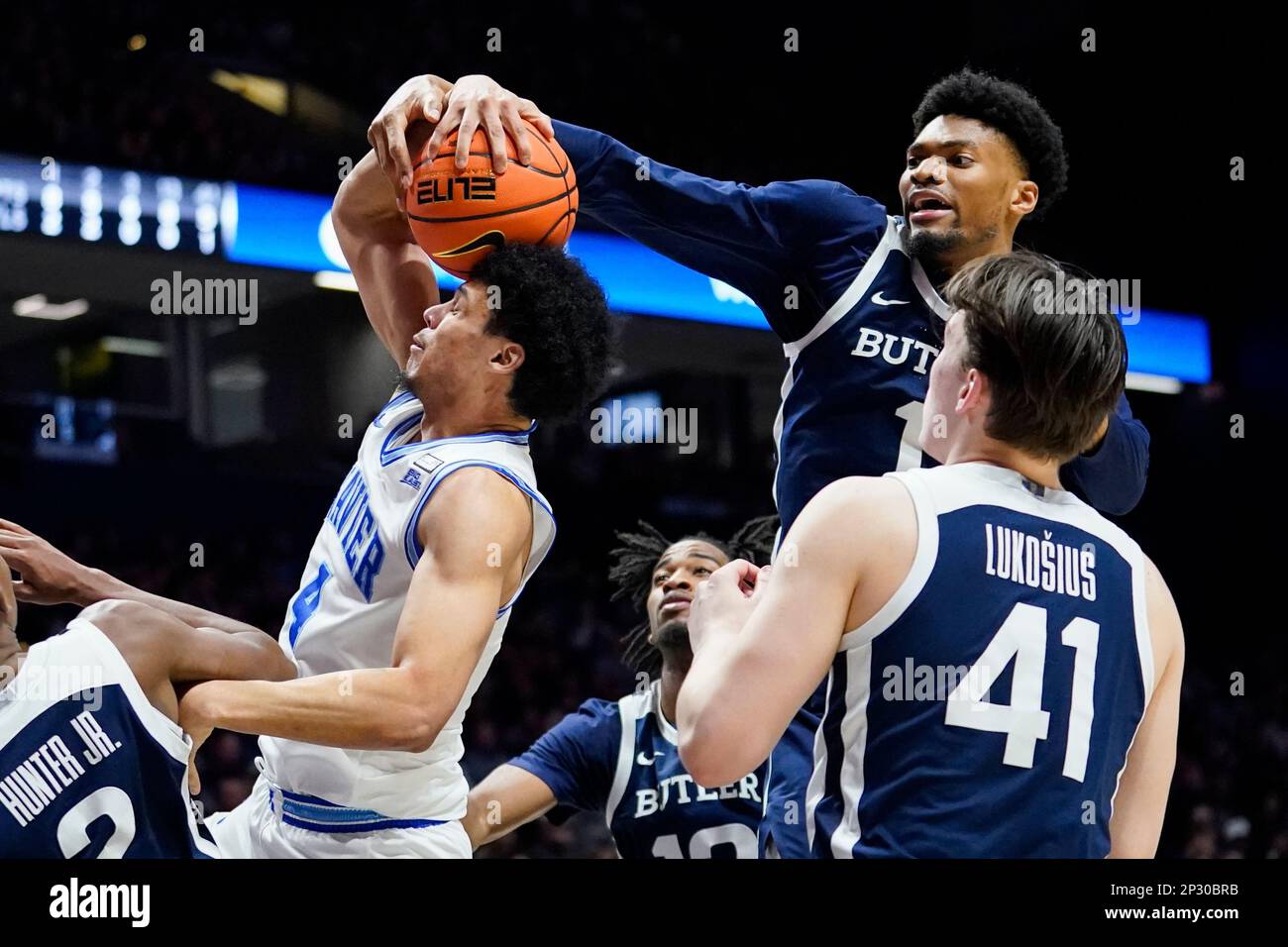Xavier forward Cesare Edwards (4) and Butler forward Jalen Thomas (1 ...