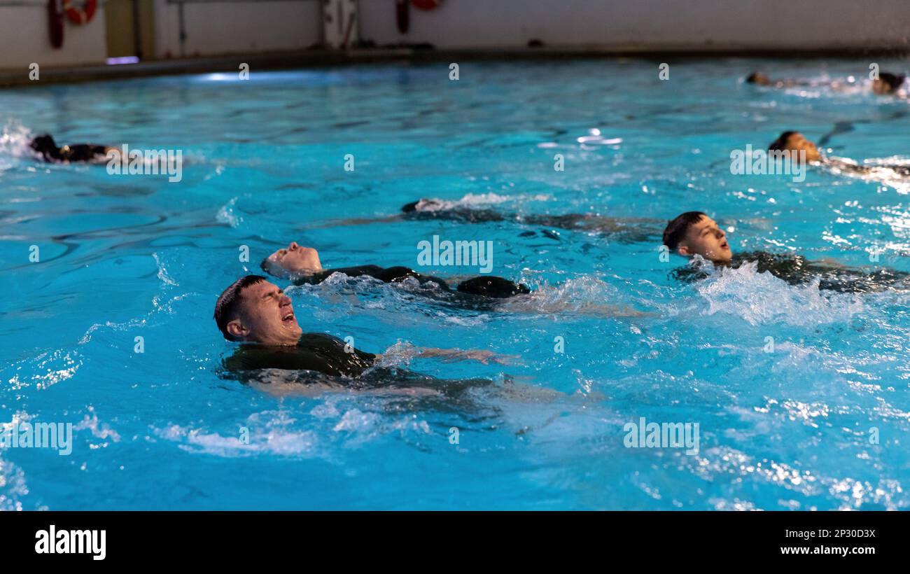 U.S. Marines with Marine Corps Base Quantico, swim during a physical ...