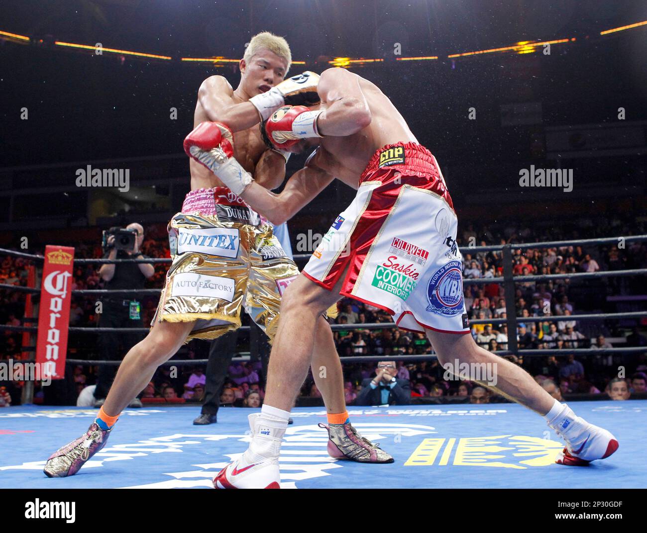 Jamie McDonnell, right, fights Tomoki Kameda during the fifth round of ...