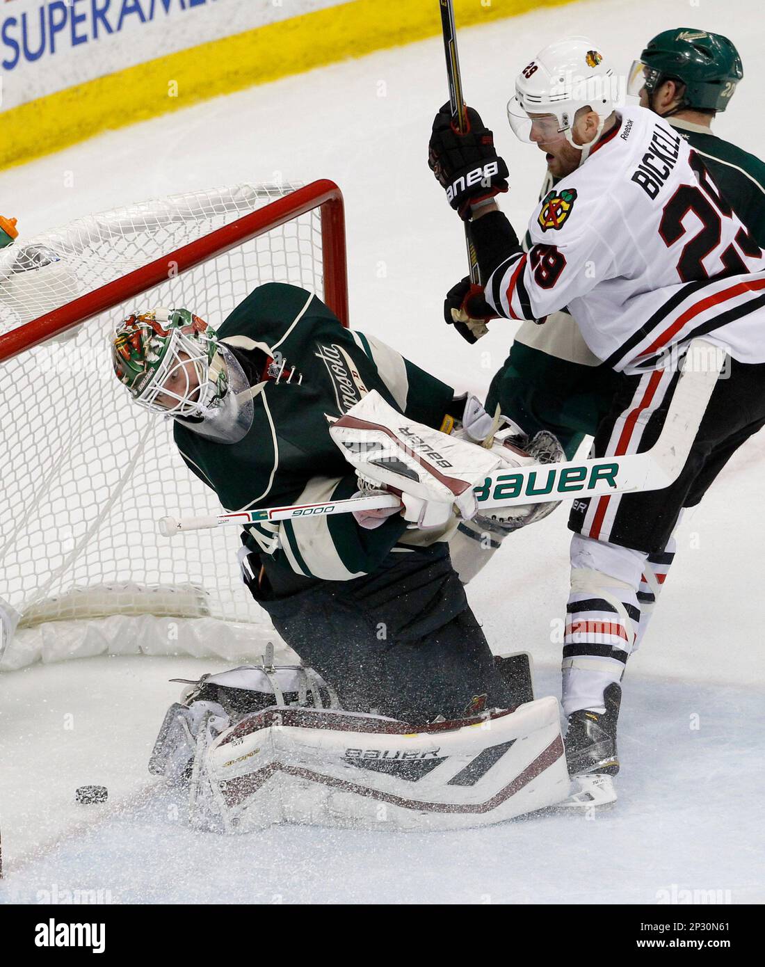 Chicago Blackhawks left wing Bryan Bickell (29) watches as a shot by ...