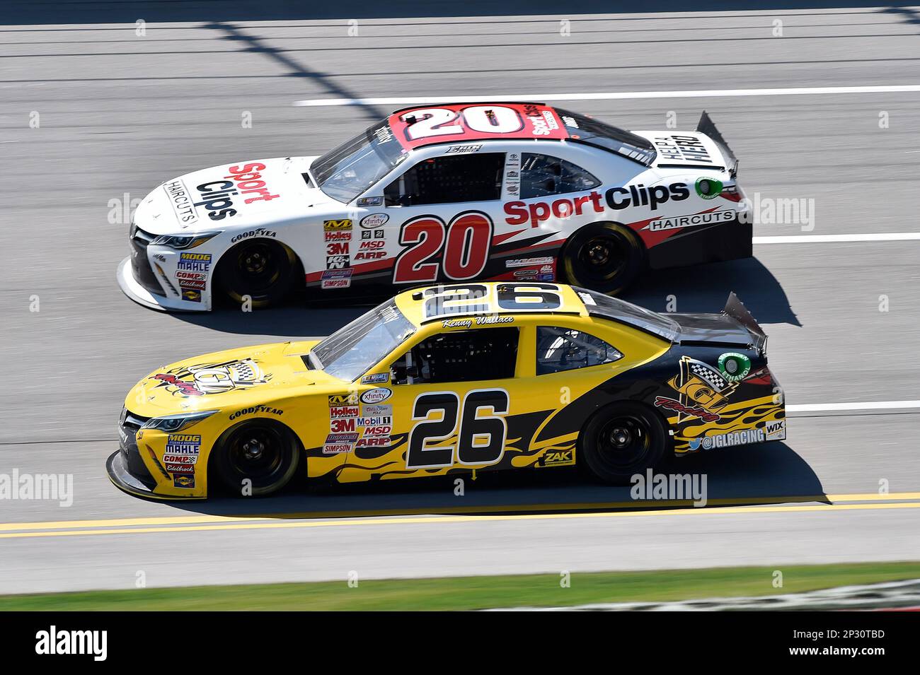 Erik Jones, Sport Clips Toyota Camry (19) races with Kenny Wallace (26 ...