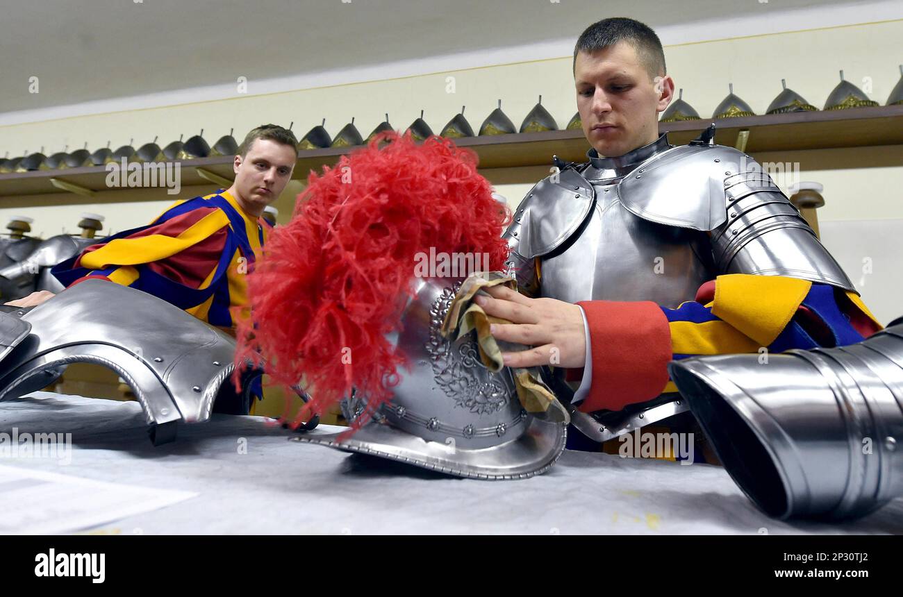 New Vatican Swiss Guards wear their uniforms and armors prior to a ...