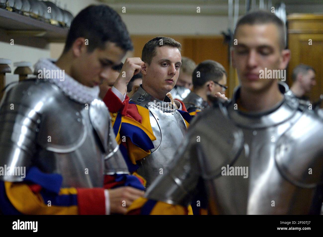 New Vatican Swiss Guards wear their uniforms and armors prior to a ...