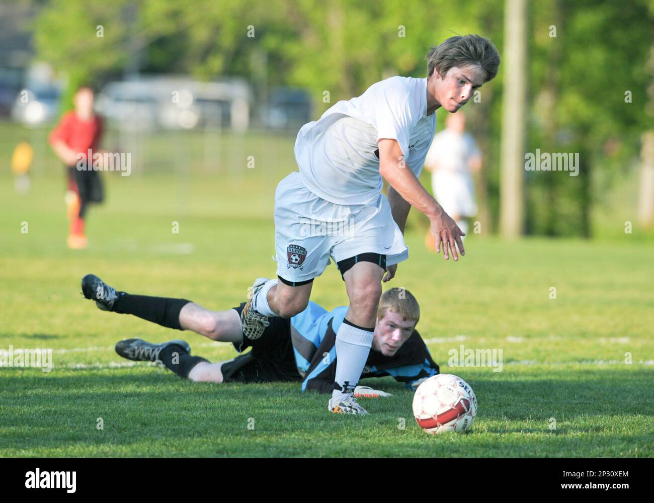 Alcoa High School's Ben Smith moves past Scott High School keeper ...