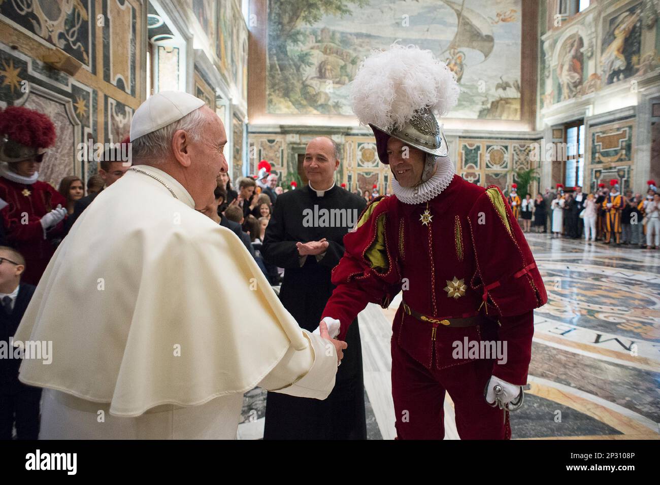 Pope Francis shakes hands with Swiss Guard commander Lt. Col. Christoph ...