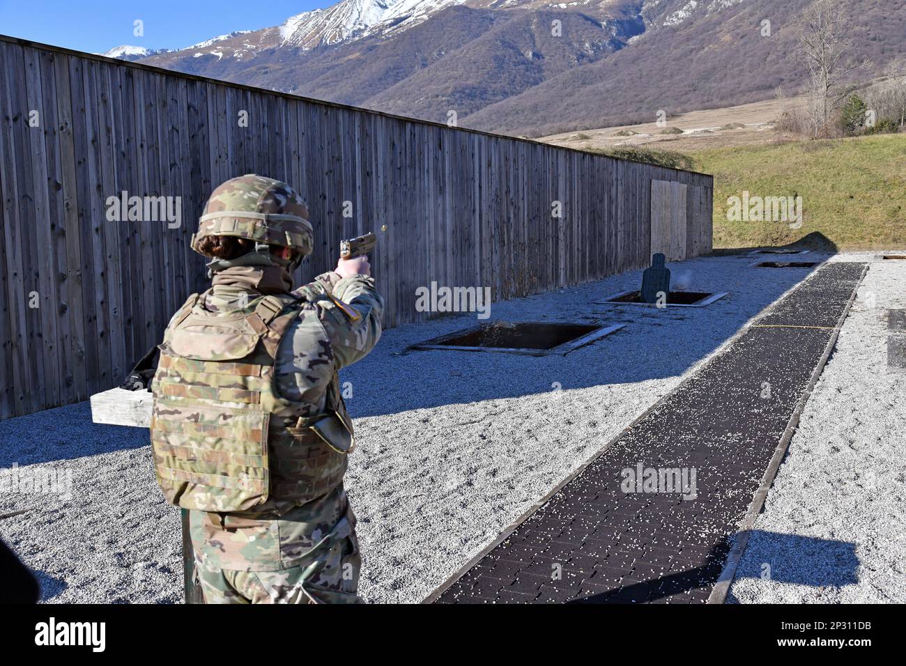 Staff Sgt. Megan Hataway assigned to the U.S Army Public Health Activity - Italy engages a pop ...