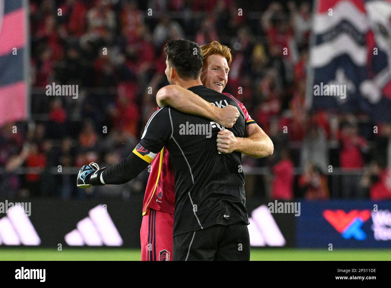 St. Louis City SC defender Tim Parker, right, and goalkeeper Roman ...