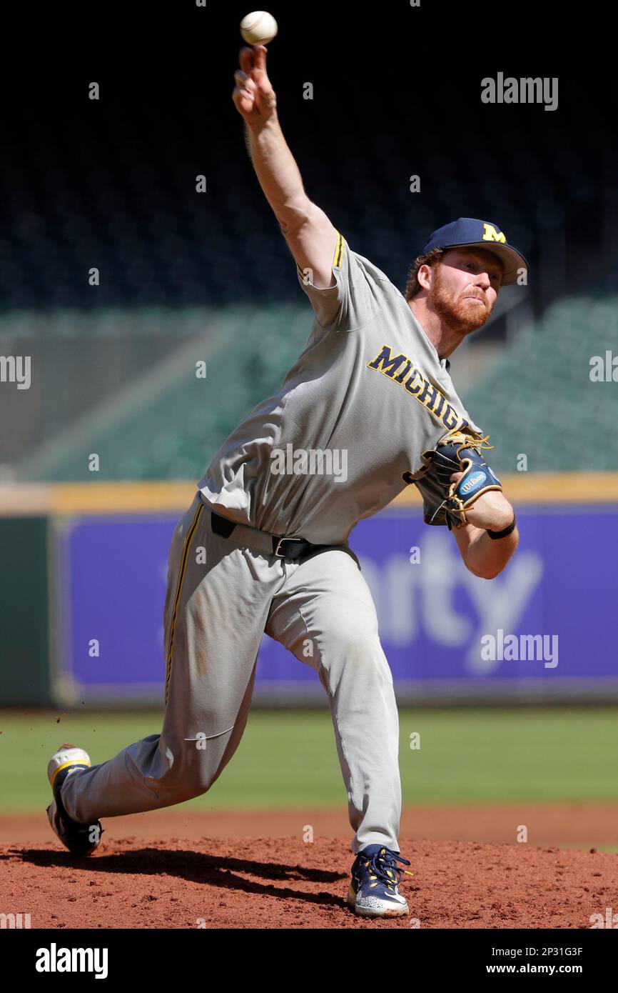 Michigan starting pitcher Chase Allen throws against Texas Tech during ...