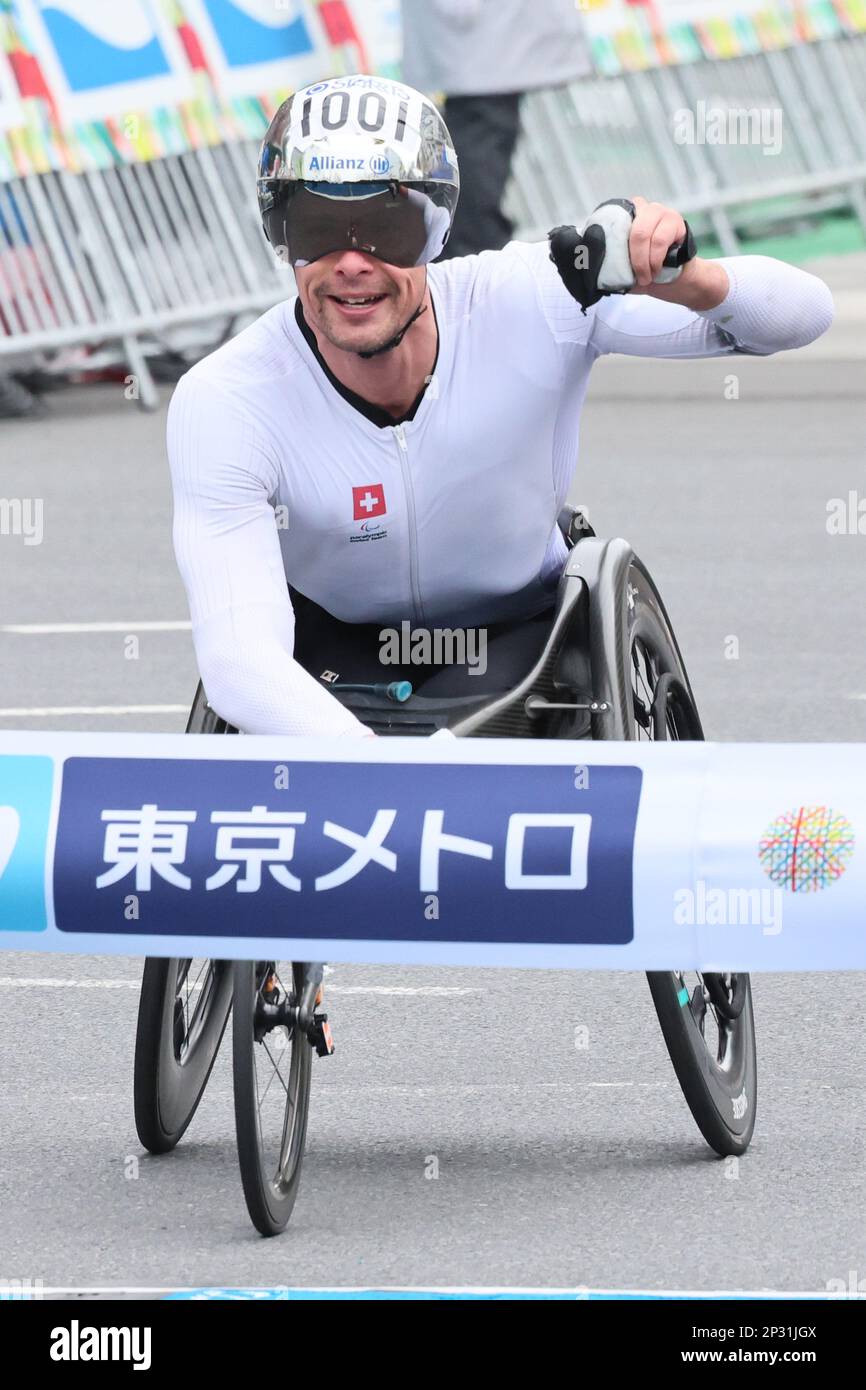 Tokyo, Japan. 5th Mar, 2023. Marcel Hug crosses the finish line of the ...