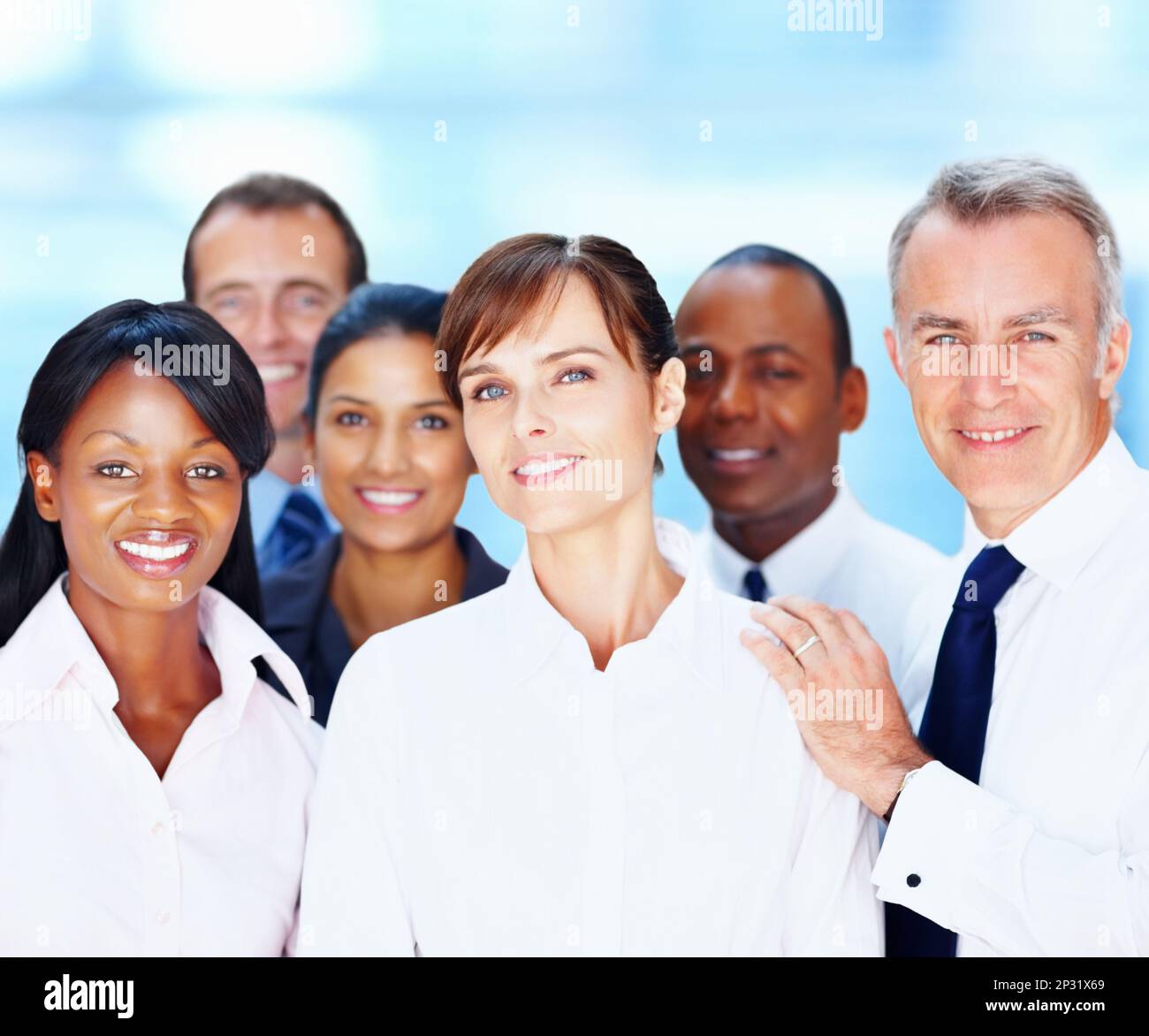 Happy and successful business people posing. Portrait of happy and ...